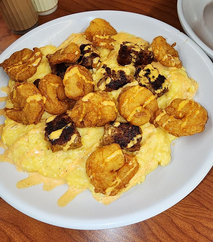 Creamy grits crowned with perfectly fried shrimp&mdash;a Southern classic that makes you understand why people write songs about regional cuisine.