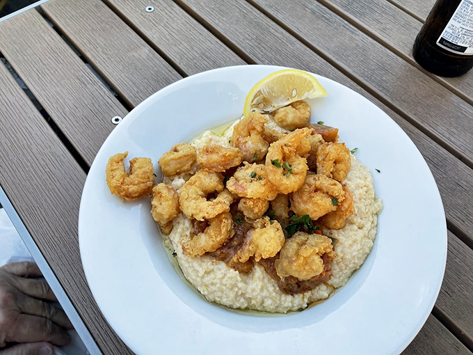 Shrimp and grits: The South's greatest love story, told in a bowl with plump crustaceans playing hard to get atop creamy cornmeal.