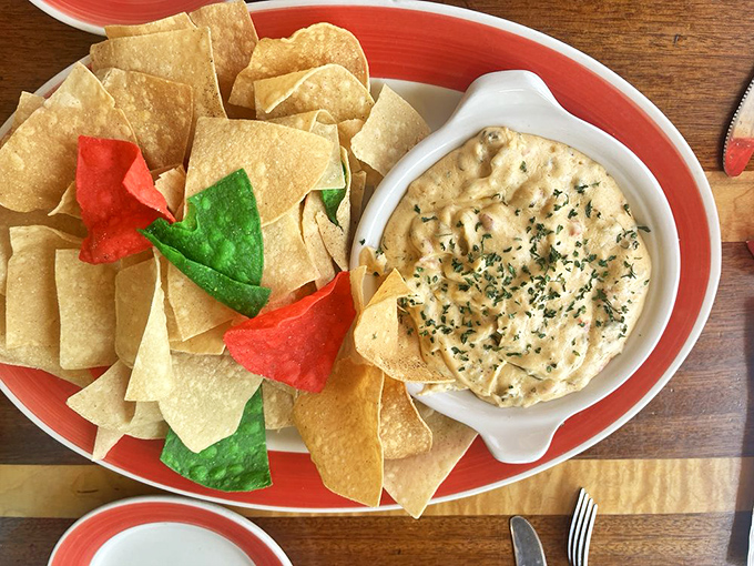 Creamy, dreamy seafood dip with festive chips that's meant for sharing, but we won't judge if you don't. Strategic chip-dipping advised.