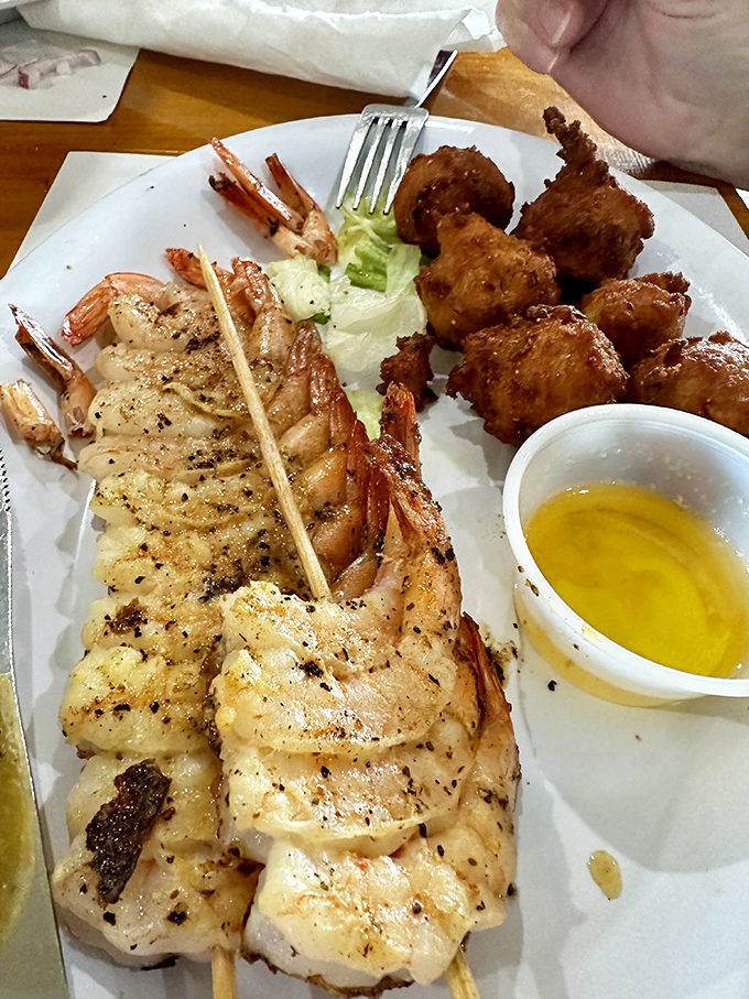 These grilled shrimp skewers and hush puppies aren't just a meal&mdash;they're edible postcards from coastal Florida.