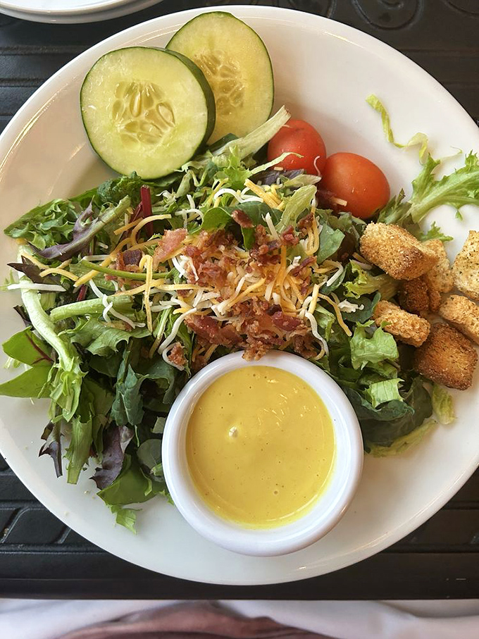 Even the side salad gets the star treatment&mdash;fresh greens, crisp vegetables, and house-made dressing that makes you wonder why you ever settled for the sad desk salad back home.