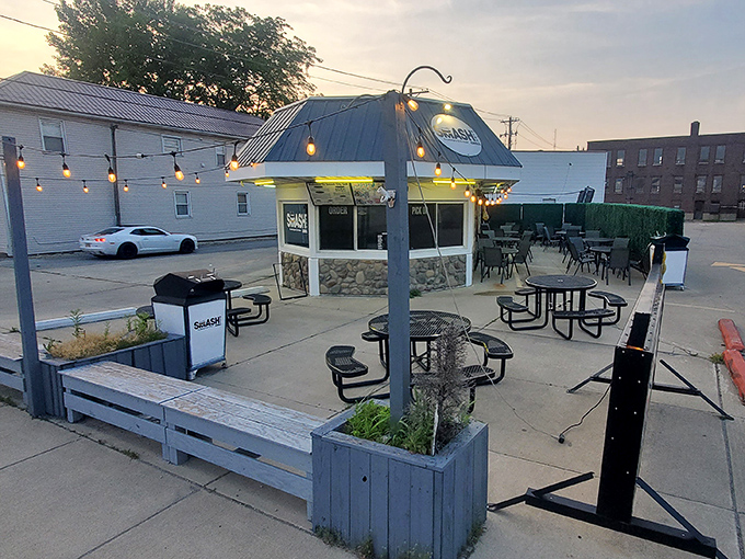 Twilight transforms this outdoor dining spot into a string-light paradise where summer evenings stretch as long as the conversations.
