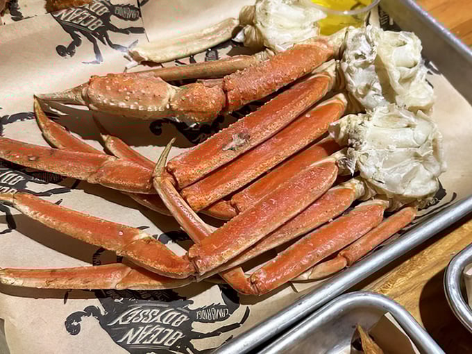 Snow crab legs sprawl across the tray like treasures from the deep &ndash; sweet, tender meat waiting to be extracted and dipped in melted butter.