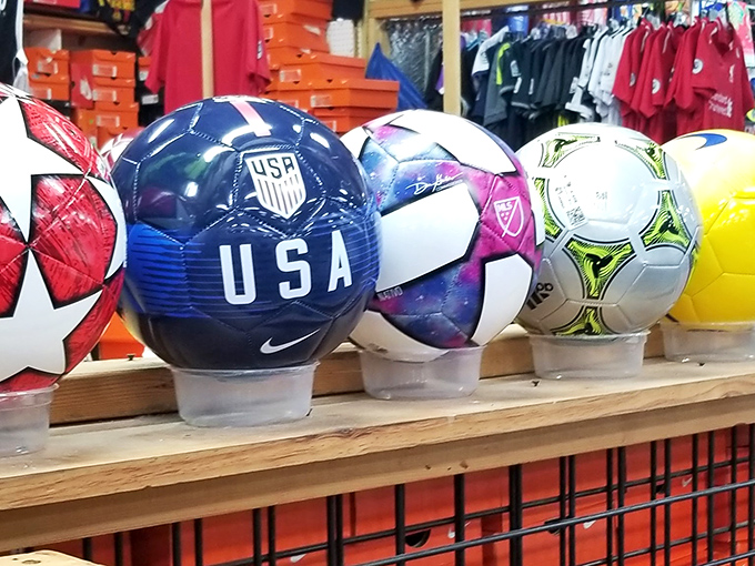 Soccer balls lined up like soldiers ready for battle. Find your perfect match without the sporting goods store markup.