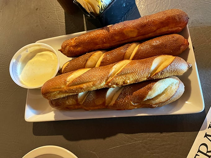 Soft pretzel sticks with mustard dipping sauce offer the perfect start to any hearty Pennsylvania dining adventure.