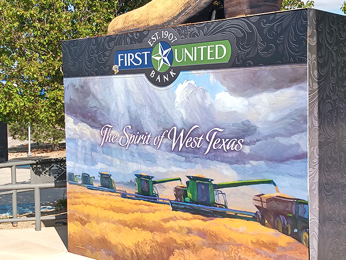 The First United Bank sponsorship sign adds local flavor, showing how businesses embrace their towering mascot with genuine Texas pride.