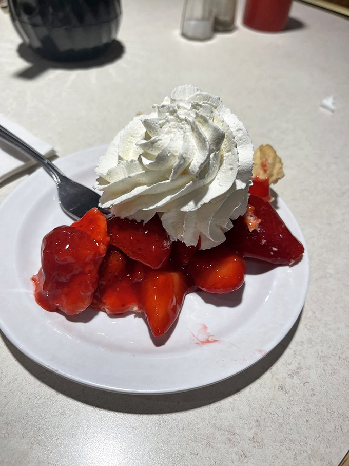 Strawberry pie that makes you understand why people write songs about summer &ndash; fresh berries nestled in their natural juices, crowned with real whipped cream.