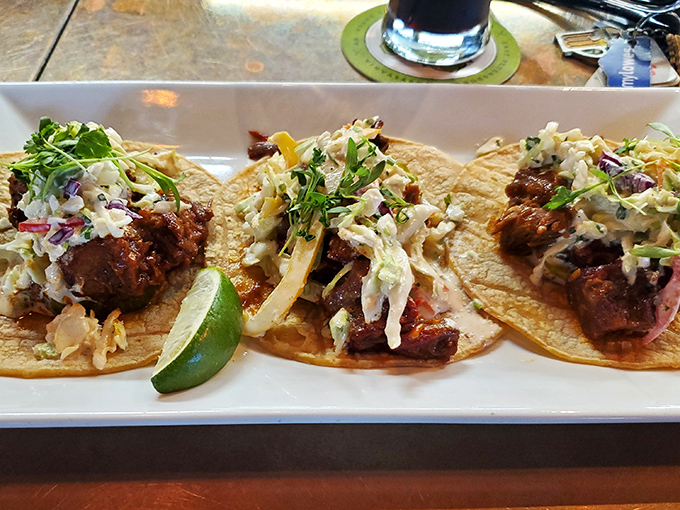 Street tacos that transport you to a Mexican roadside stand, complete with lime wedges that wait patiently for their squeeze of citrus glory.