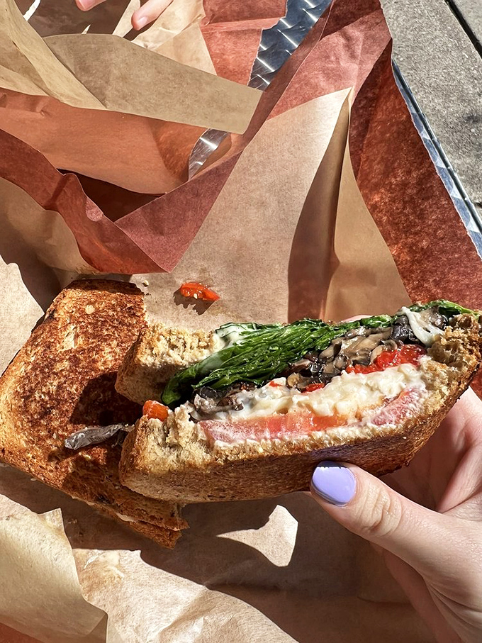 The Bella Donna sandwich flaunts its fresh ingredients like a fashionista on the runway. Those herbs aren't just garnish—they're the main event.