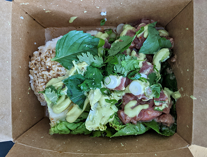 When a salad comes in a cardboard box looking this vibrant and fresh, you know you're not at some sad airport kiosk&mdash;this is the real, leafy deal.