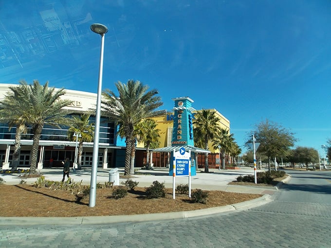 The Grand Theatre stands like a beacon of entertainment, promising air-conditioned refuge when you've had enough vitamin D for one day.