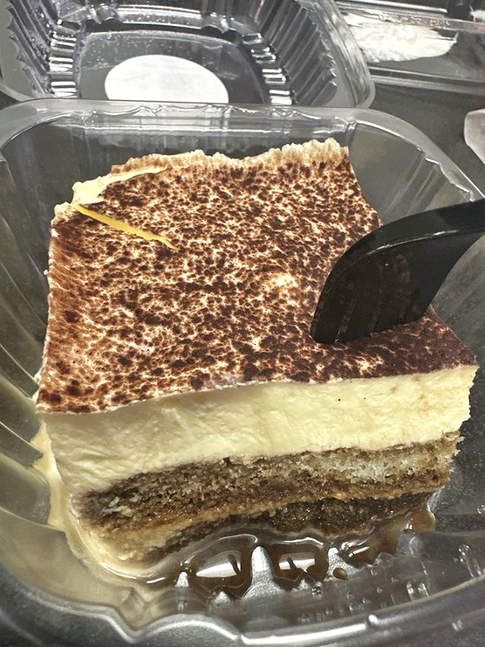 Tiramisu so perfectly layered it could teach geology classes, with strata of coffee-soaked ladyfingers and mascarpone that deserve scientific study.