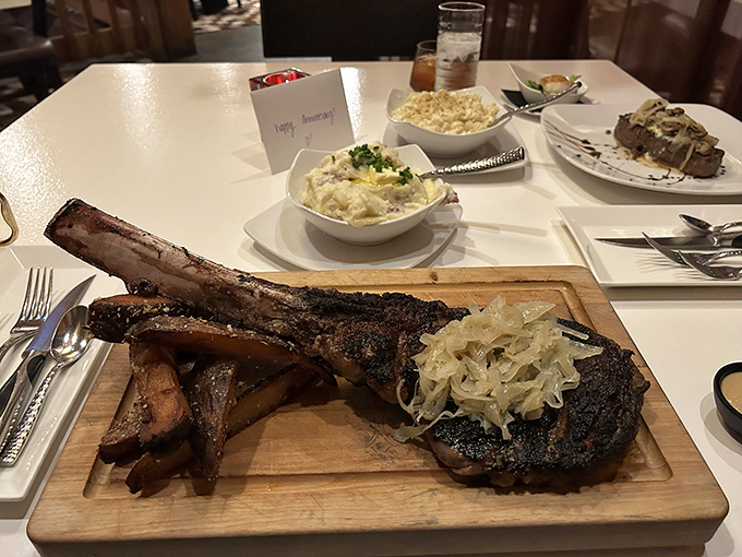 The tomahawk steak arrives like a medieval weapon of mass deliciousness, commanding the table with its impressive bone-in presence.