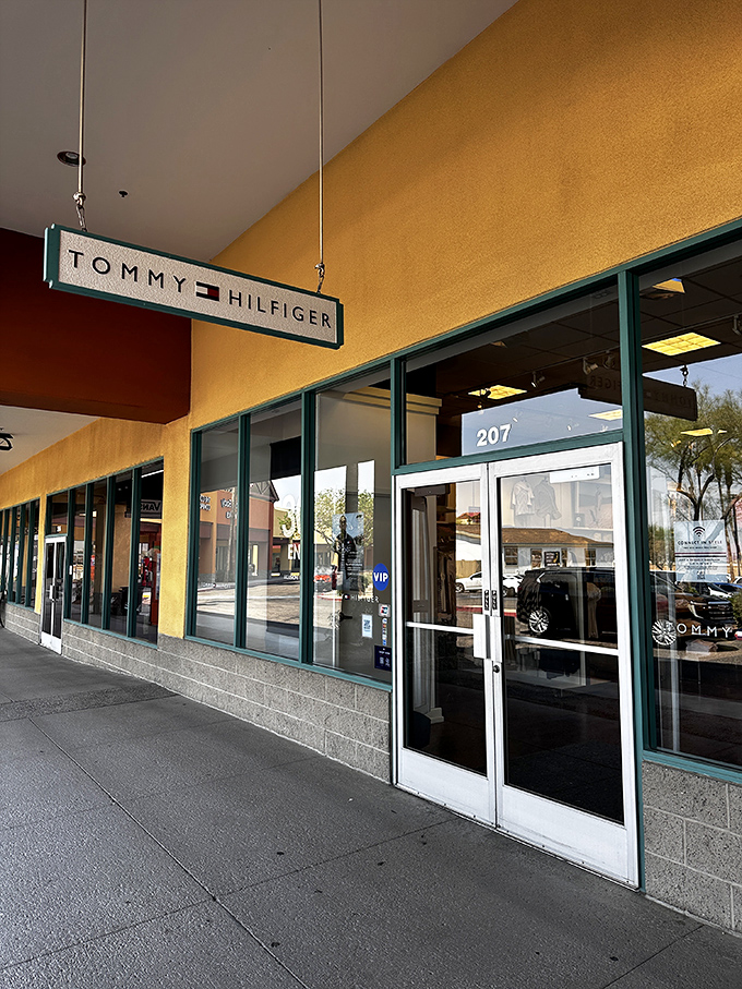 Tommy Hilfiger's classic Americana awaits behind those gleaming doors, where red, white, and blue never goes out of style.