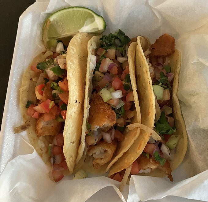 Fish tacos that look like they're dressed for a party. Fresh, vibrant, and topped with enough pico de gallo to make every bite a celebration.
