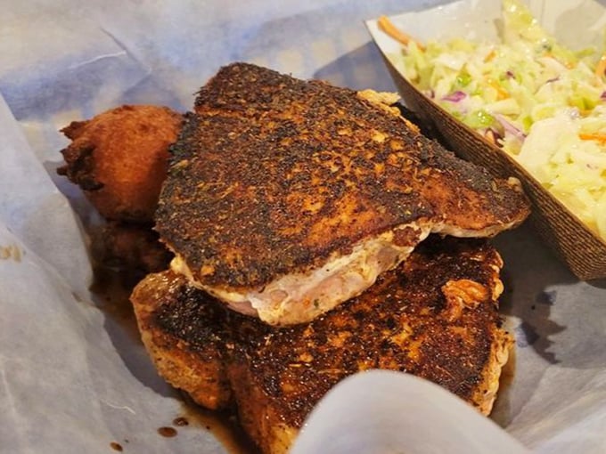 Blackened fish that wears its seasoning like a badge of honor. The spice crust creates a flavor fortress protecting the tender flesh within.