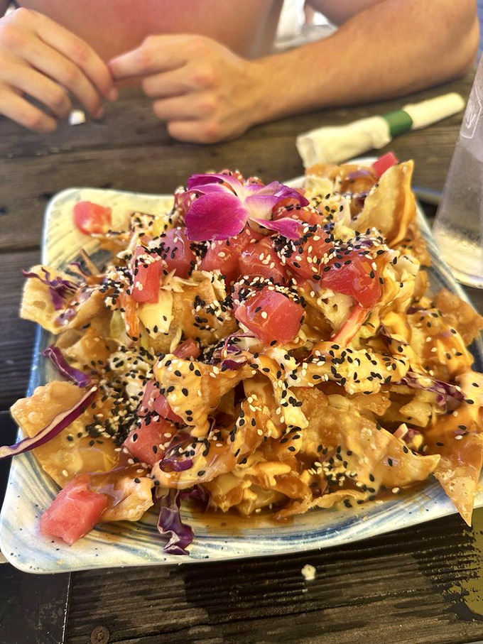 Not your average nachos! These tuna-topped crisps with vibrant garnishes are what happens when sushi and Tex-Mex have a beachfront romance.
