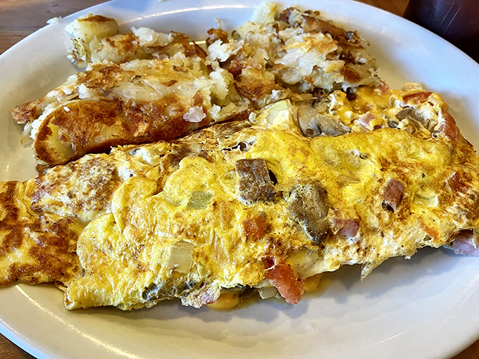 The Ultimate Omelette lives up to its name&mdash;a yellow canvas painted with all the breakfast favorites your heart desires.