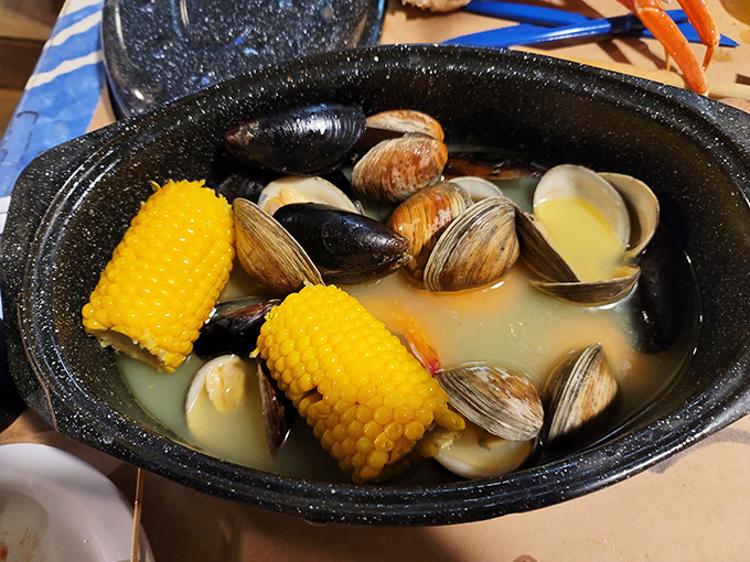 The ultimate steamed pot—a treasure chest of clams, mussels, and corn swimming in buttery broth. Neptune himself would approve.