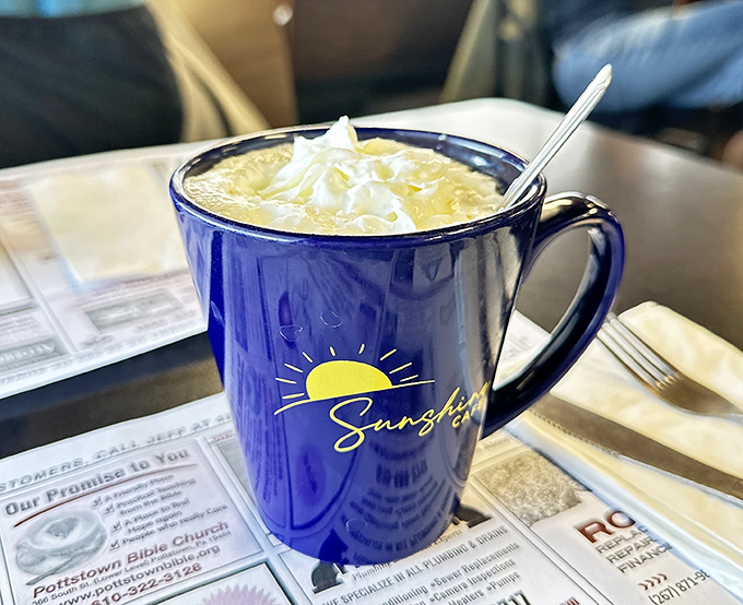 Their signature blue mug doesn't just hold coffee &ndash; it cradles liquid sunshine topped with a cloud of whipped cream.
