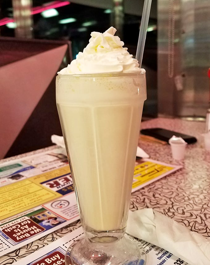 This isn't just a milkshake—it's a frothy tower of vanilla bliss that makes you wonder why anyone bothers with fancy cocktails.