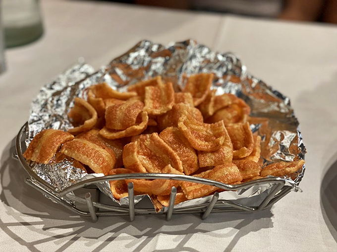 These aren't your average pork rinds&mdash;they're crispy little flavor bombs that make excellent vehicles for whatever you're drinking.