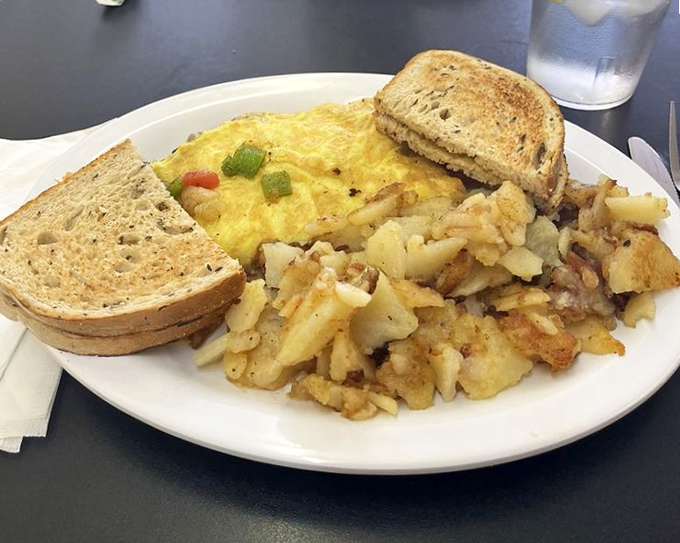This isn't just an omelet&mdash;it's a colorful patchwork quilt of vegetables and cheese that makes "eating your veggies" feel like breaking the rules.