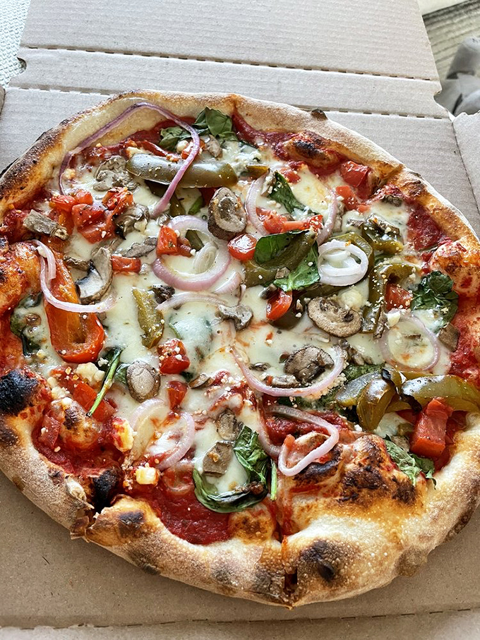 A veggie pizza so loaded it counts as a farmer's market visit&mdash;mushrooms, peppers, and onions in perfect harmony.