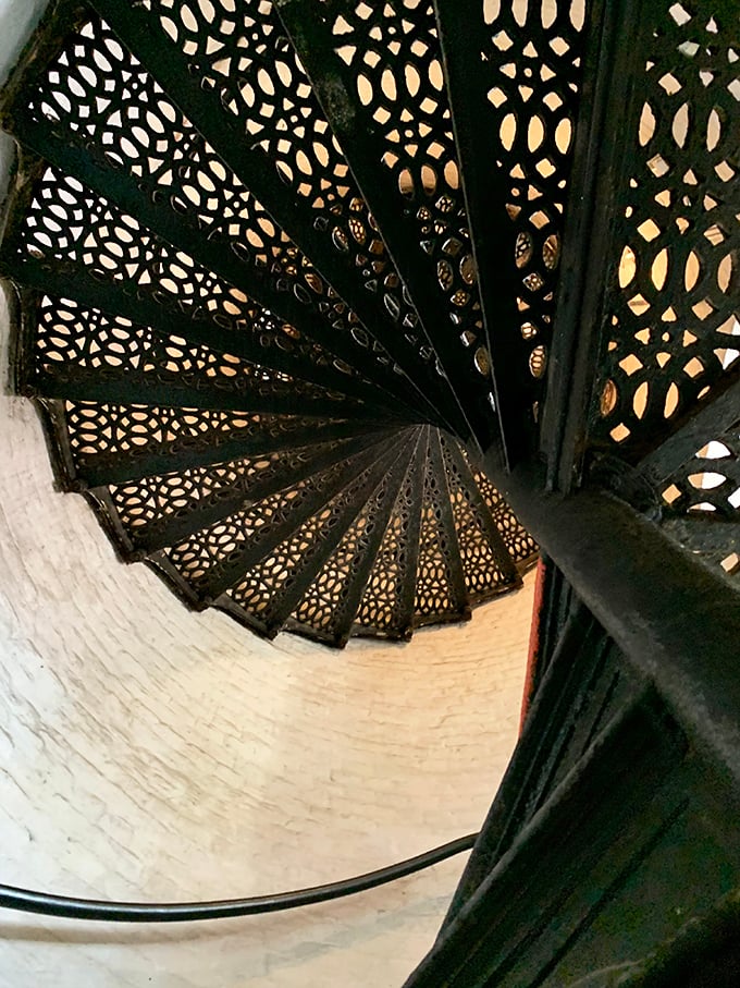 The intricate ironwork of these spiral stairs tells its own story&mdash;functional art that's been guiding keepers upward since the Victorian era.