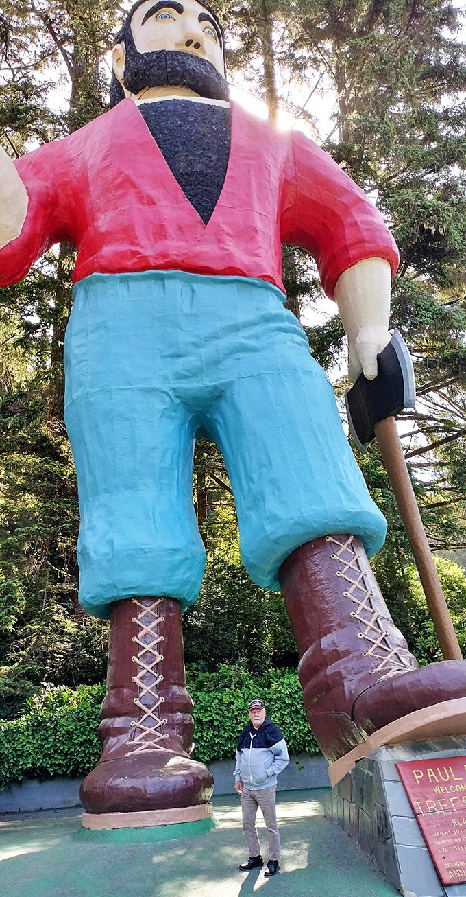 Paul Bunyan's statue reminds visitors that even legendary lumberjacks would feel small among these giants.