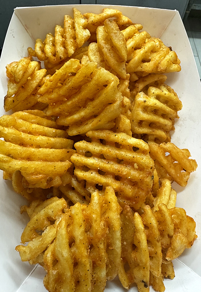 Not just fries&mdash;waffle fries. The extra surface area isn't just for show&mdash;it's more real estate for seasoning to call home.