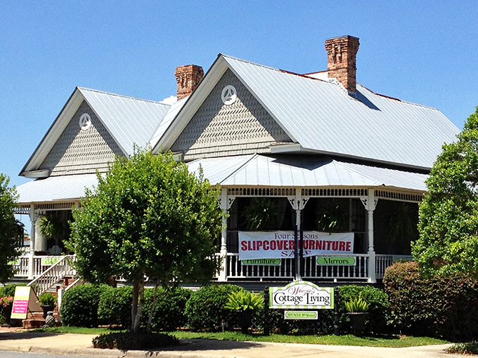 Victorian charm meets modern retail at this picture-perfect cottage, where the wraparound porch practically begs you to sit a spell.