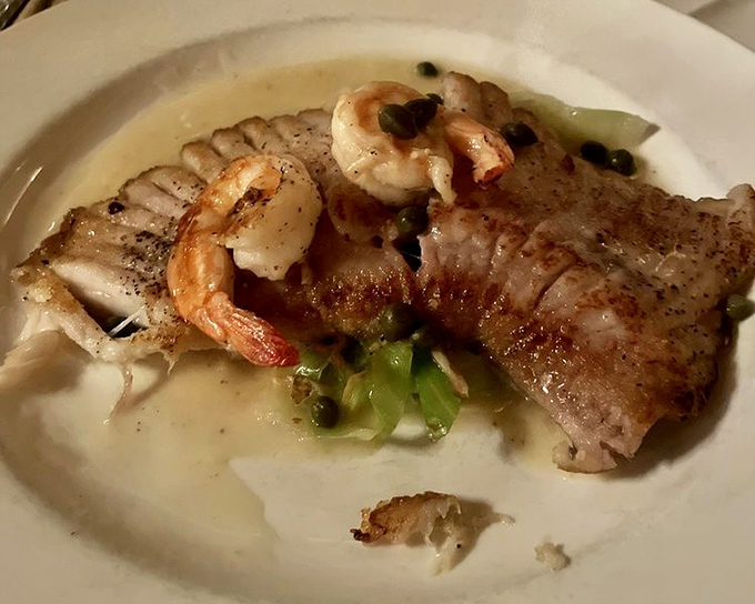 Tender fish and plump shrimp in buttery sauce&mdash;a plate that would make Poseidon himself put down his trident and pick up a fork.