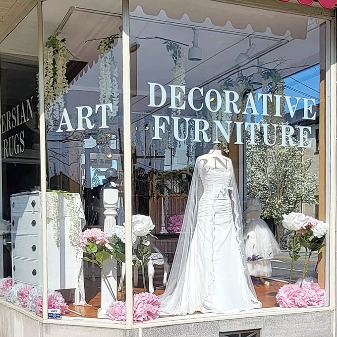 The window display showcases wedding attire from eras when "something borrowed" might have been your grandmother's entire dress, not just her handkerchief.