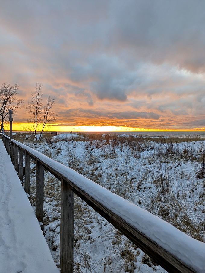 Winter transforms Weko Beach into a snow-dusted wonderland where the boardwalk becomes a front-row seat to nature's quieter season.
