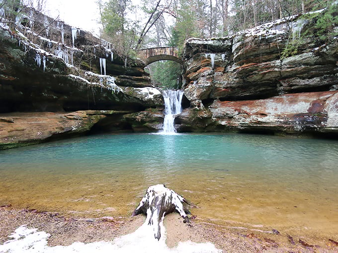 Winter transforms Upper Falls into a frozen fantasy. The icicles and blue-tinged pool could convince you you've wandered onto a movie set.