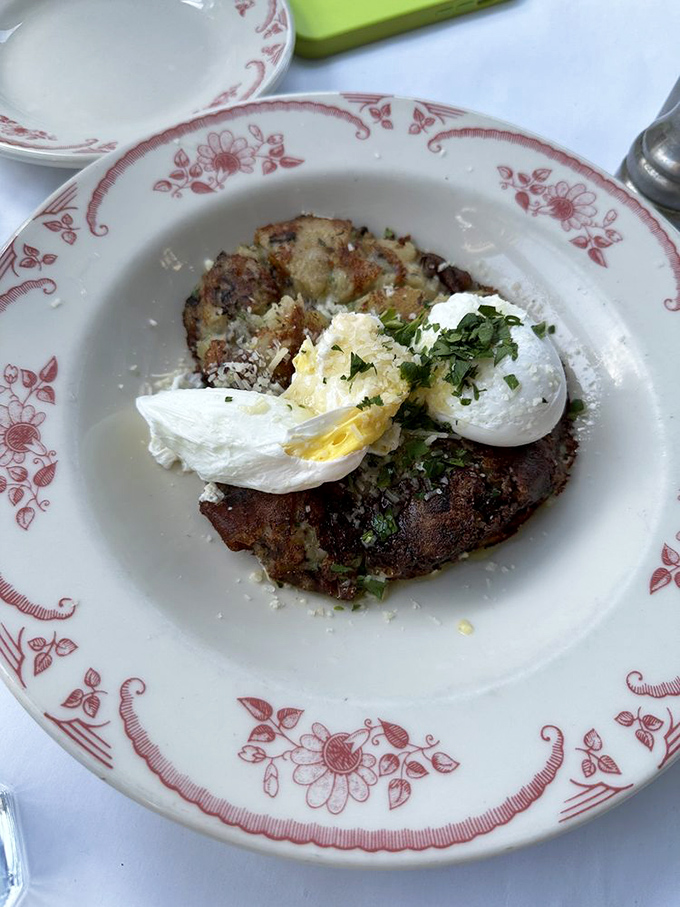 Potato hash crowned with poached eggs that break open like nature's perfect sauce. Comfort food that hugs you from the inside out.