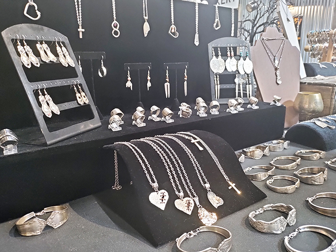 Handcrafted silver jewelry gleams under display lights, each piece waiting to become someone's "I found this amazing little place in Ohio" story.