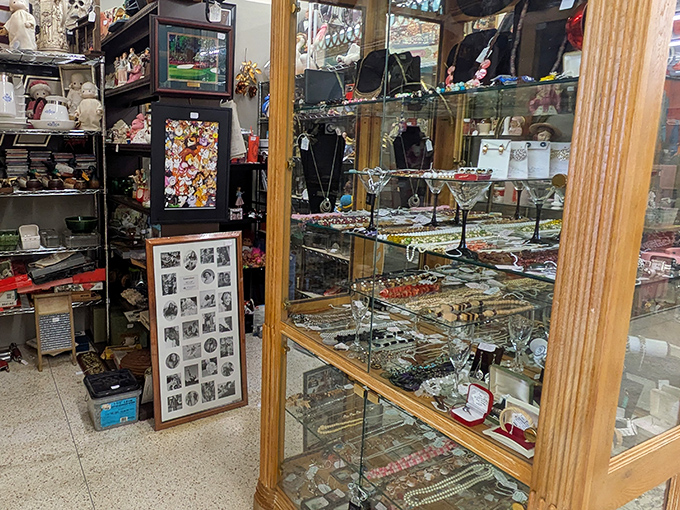 Glass cases protecting jewelry treasures like a museum where everything's actually for sale, thankfully.