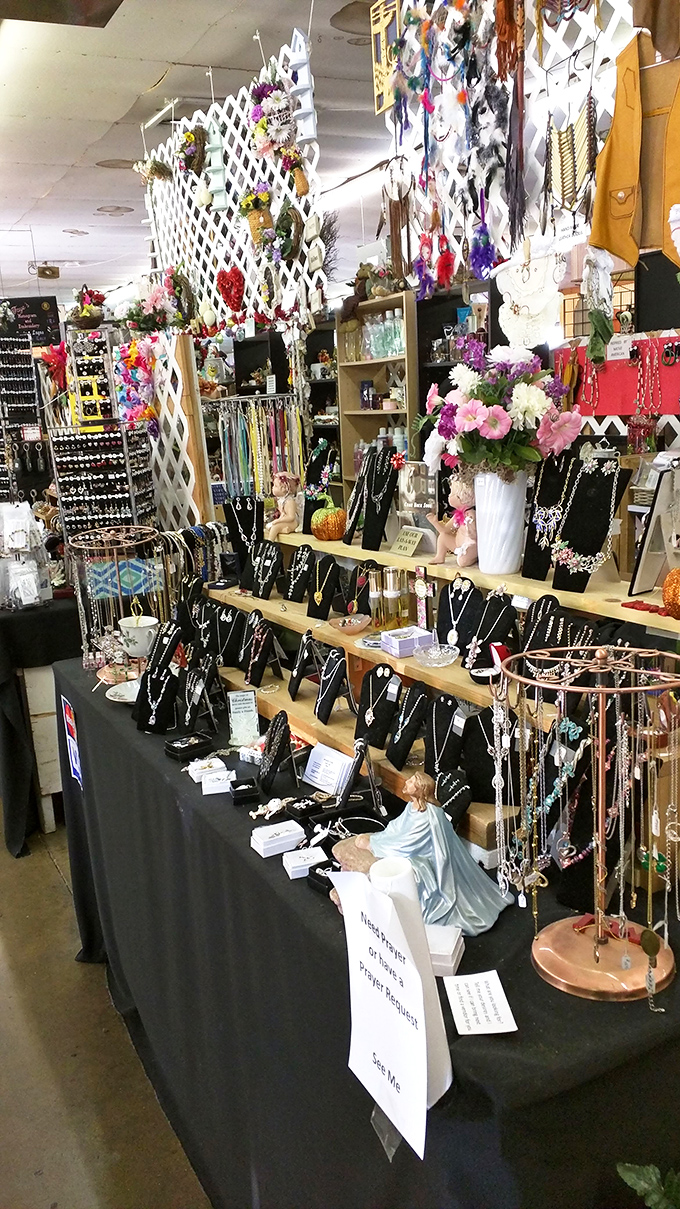 This jewelry vendor transforms white lattice into a sparkling gallery where yesterday's accessories find tomorrow's admirers.