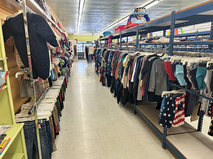 Clothing racks stretch toward the horizon like a textile landscape, each hanger potentially holding that perfect piece you never knew you needed.