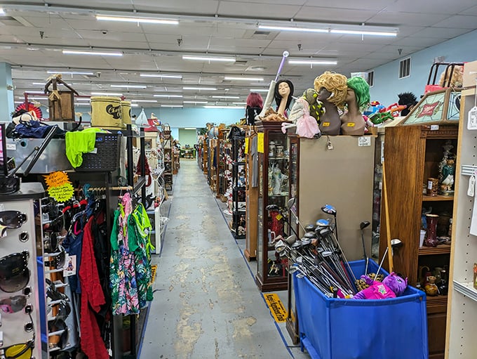 Down these aisles, mannequin sentinels stand guard over kingdoms of collectibles, each booth a different chapter in the story of American stuff.