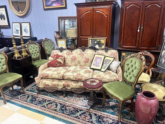 Victorian elegance meets Southern charm in this furniture display. That floral sofa has "Sunday afternoon naps" written all over it.