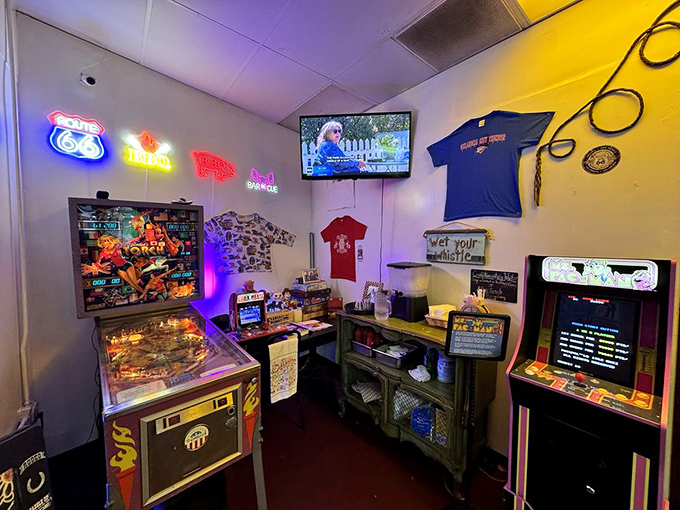 The arcade corner proves that good barbecue places understand that sometimes adults need playtime too, especially between meat sweats.