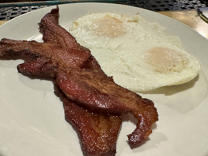 Bacon cooked to that magical place between chewy and crisp, alongside eggs with yolks as golden as Oregon sunshine.