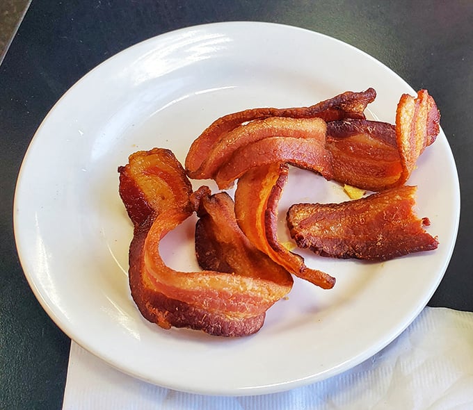 Bacon isn't just a breakfast side&mdash;it's the supporting actor that steals the show. These crispy strips deserve their own standing ovation and possibly fan mail.