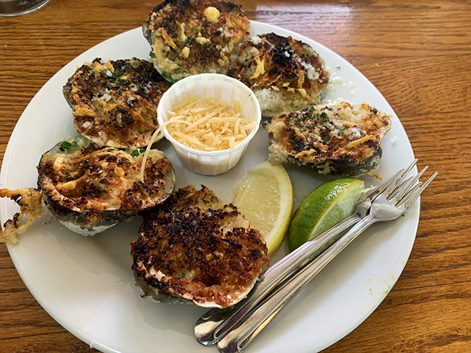 These baked clams aren't just appetizers&mdash;they're little seafood amphitheaters where butter and garlic perform their greatest hits.