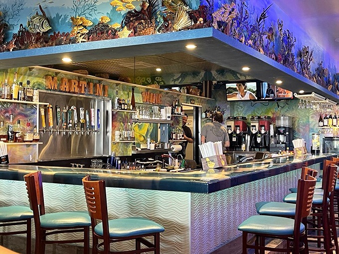 A bar that doubles as an underwater fantasy. Where martinis meet marine life under the watchful gaze of mounted sea creatures.