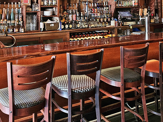 The bar showcases bottles like trophies, a testament to Momocho's serious commitment to agave spirits and your upcoming good decisions.