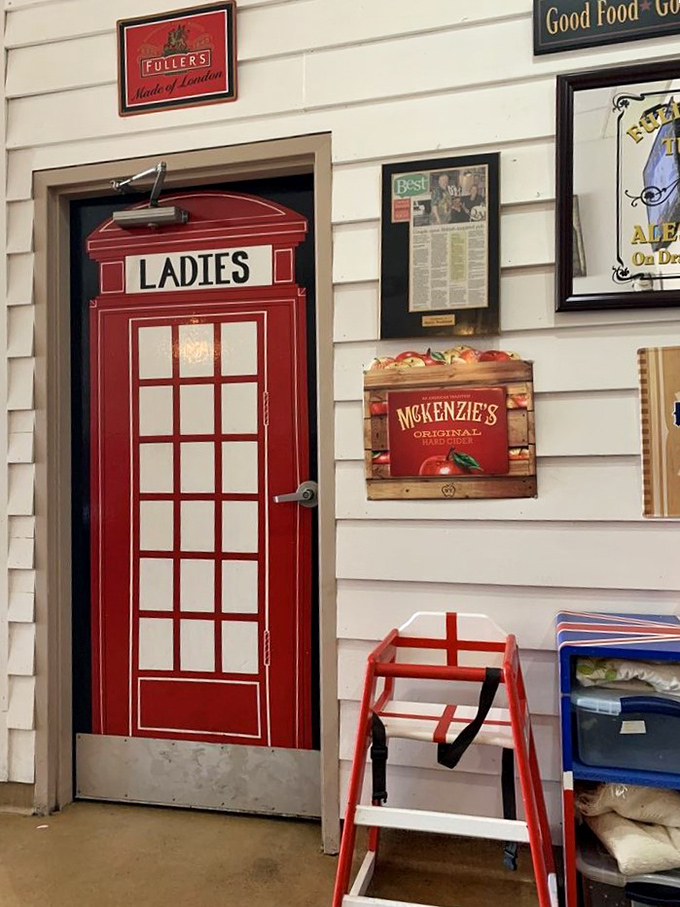 Even the restroom door gets the British treatment &ndash; a classic red telephone box that makes answering nature's call feel like an international affair.